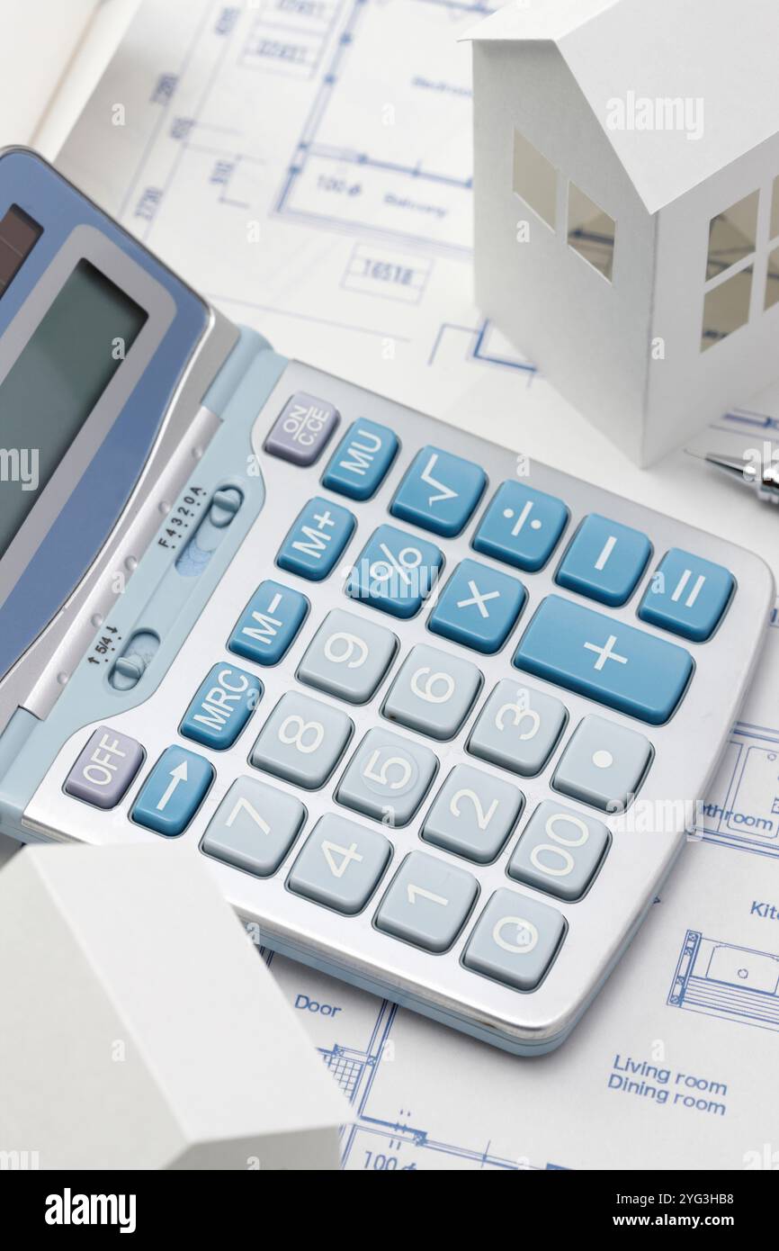 Blueprints, calculators and models Stock Photo - Alamy