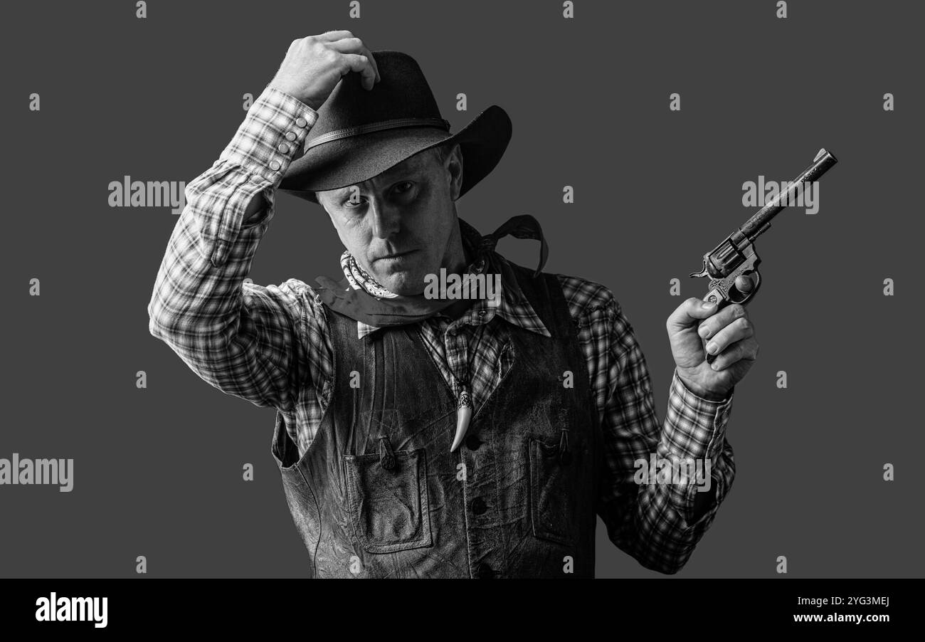 Western man with hat. Man wearing cowboy hat, gun. West, guns. Portrait ...