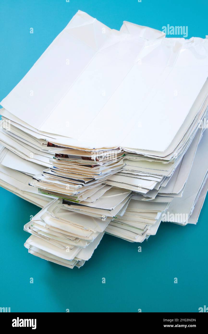 Bundles of scrap milk cartons Stock Photo - Alamy