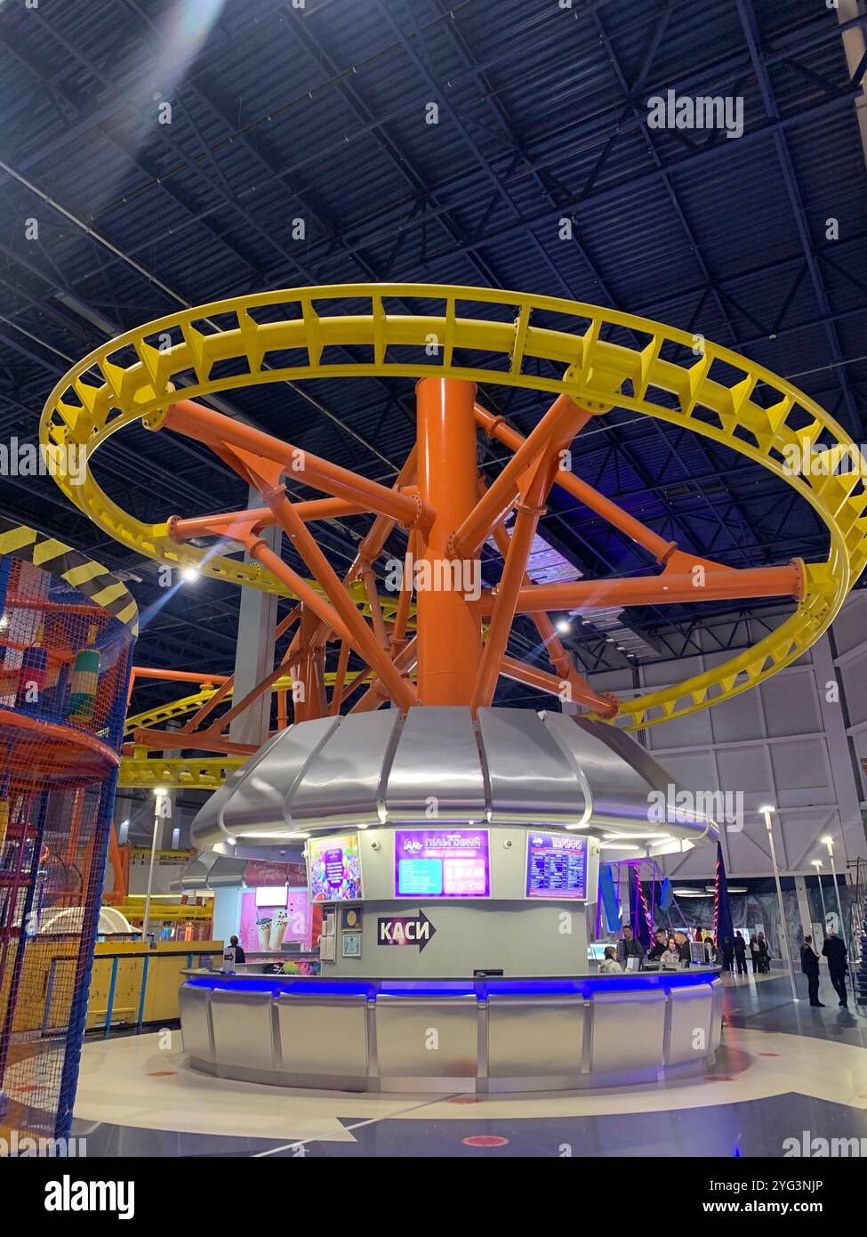 Vibrant Indoor Amusement Park Ride in Colorful Setting Stock Photo - Alamy