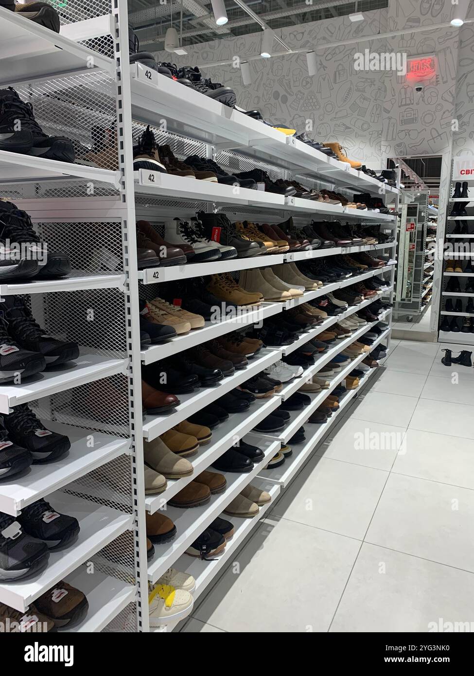 Organized Shoe Display in Modern Retail Store Stock Photo - Alamy