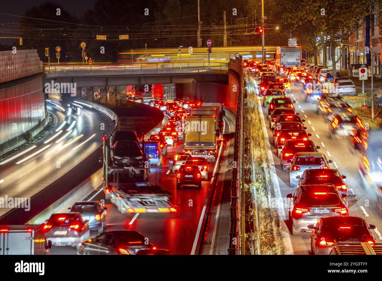 Evening traffic, partly with congestion, slow-moving traffic on the A40 motorway, traffic jam ...