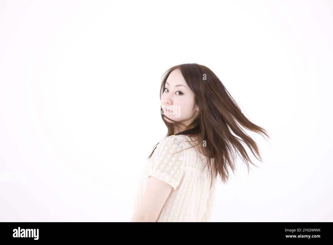 Woman turning around Stock Photo - Alamy