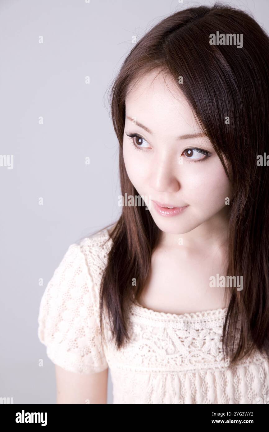 Woman staring at something Stock Photo - Alamy