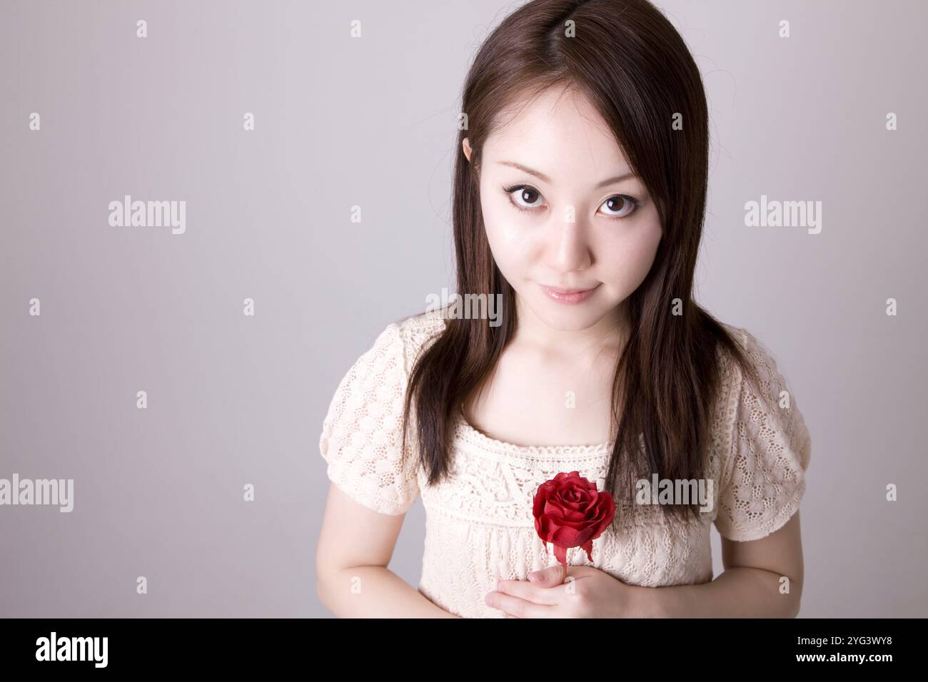 Woman with rose Stock Photo - Alamy