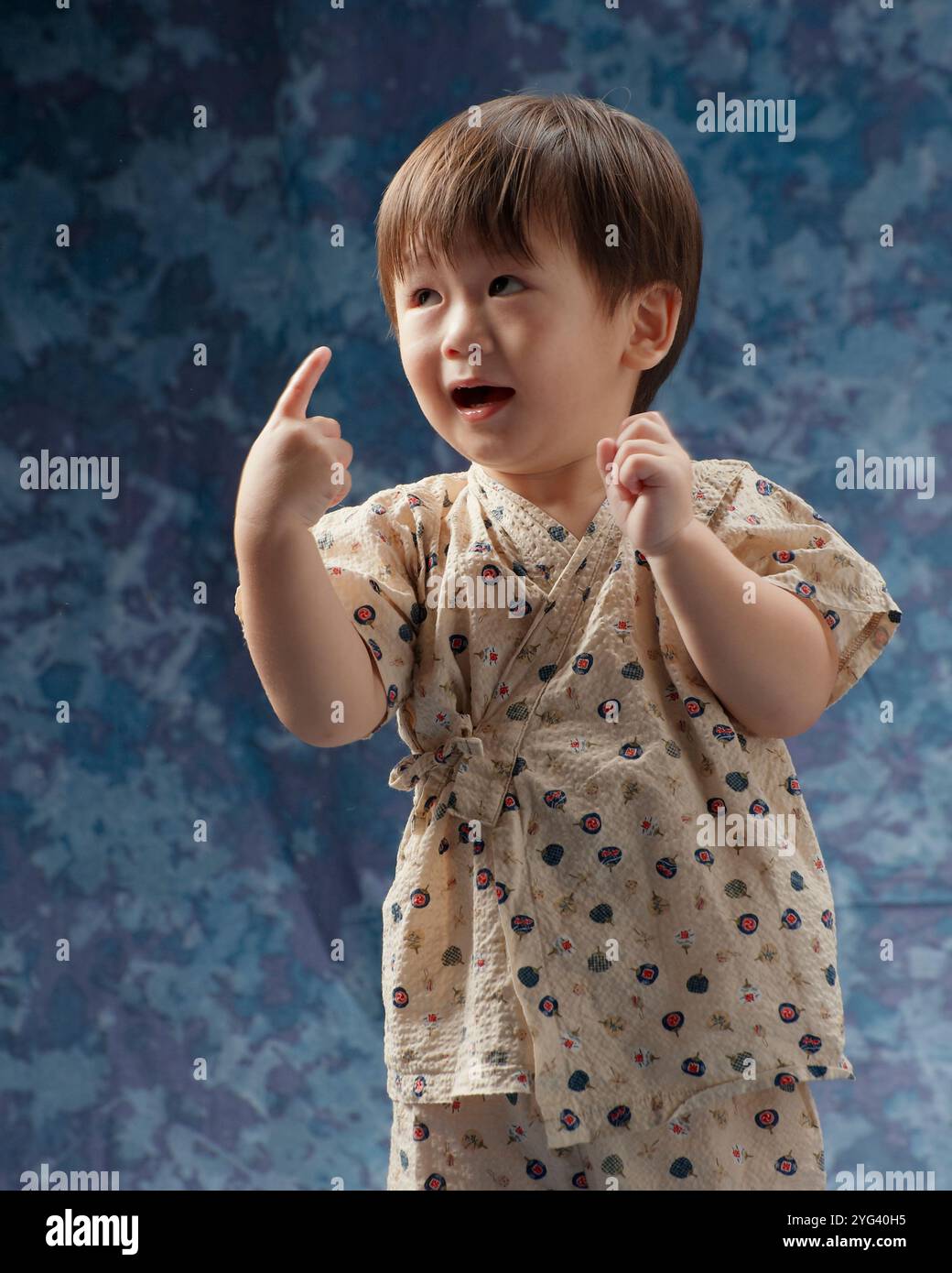 Half of a 2-year-old child wearing a jinbei Stock Photo - Alamy