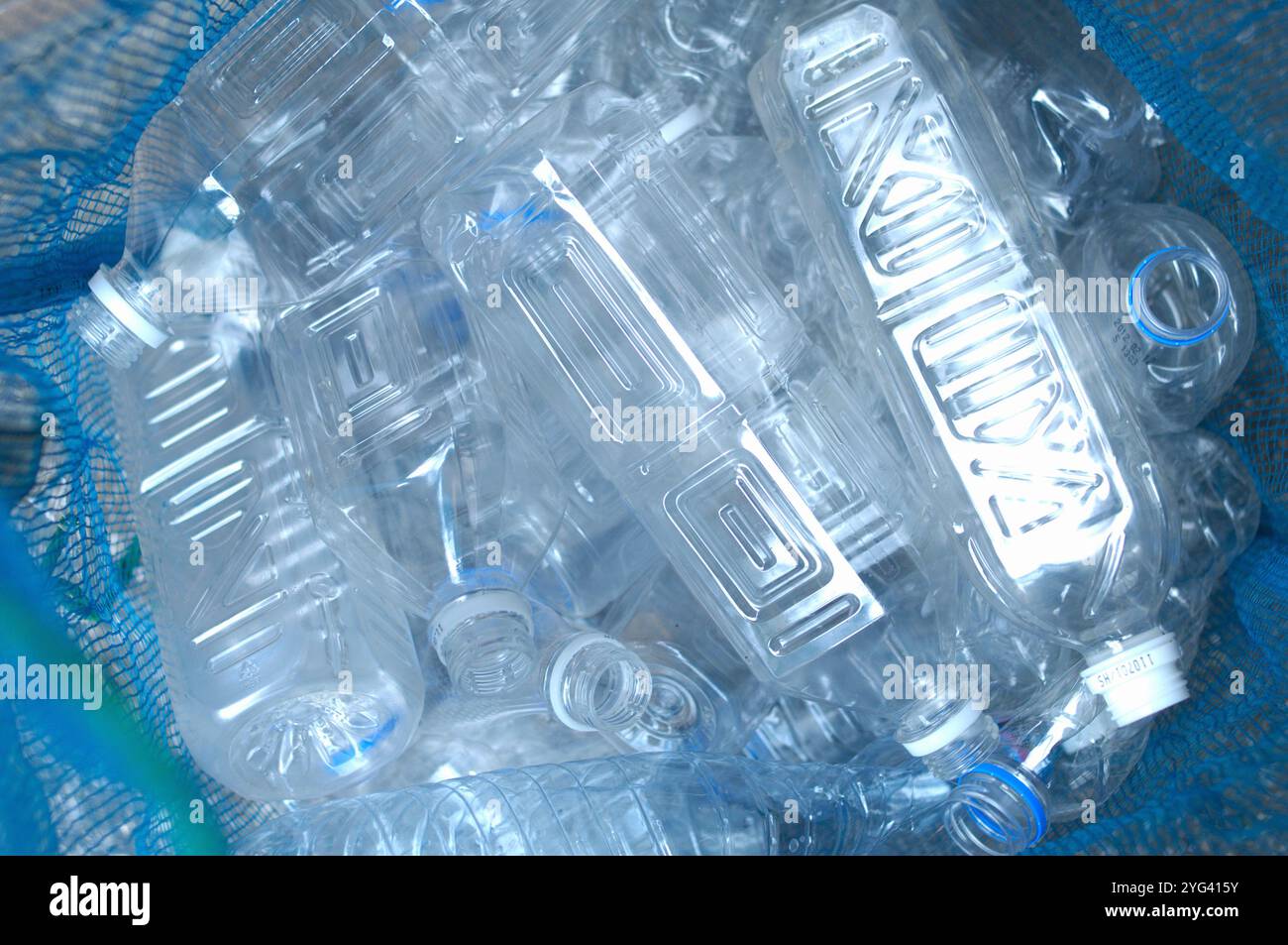 Plastic bottles being recycled Stock Photo - Alamy