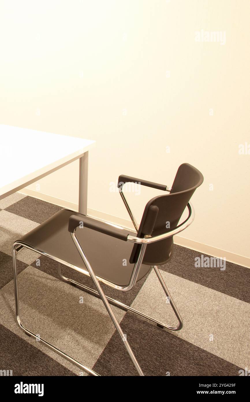 Chairs and tables in the counselling room Stock Photo - Alamy