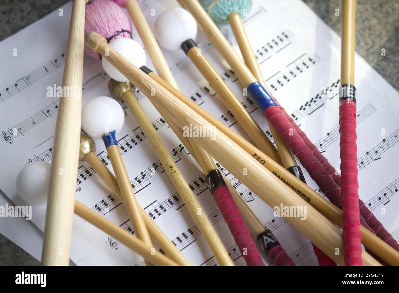 Percussion sticks and sheet music Stock Photo - Alamy