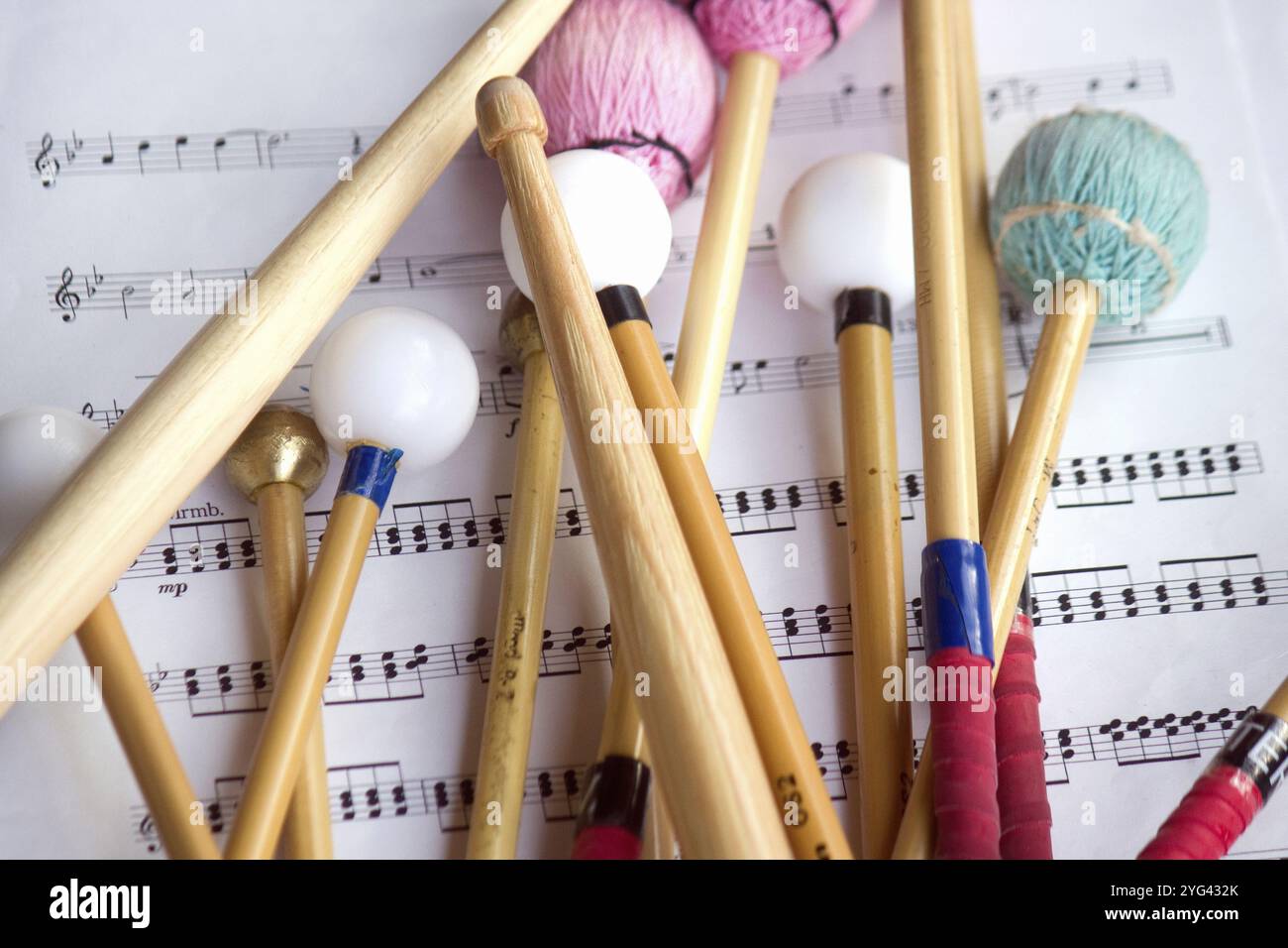 Percussion sticks and sheet music Stock Photo - Alamy