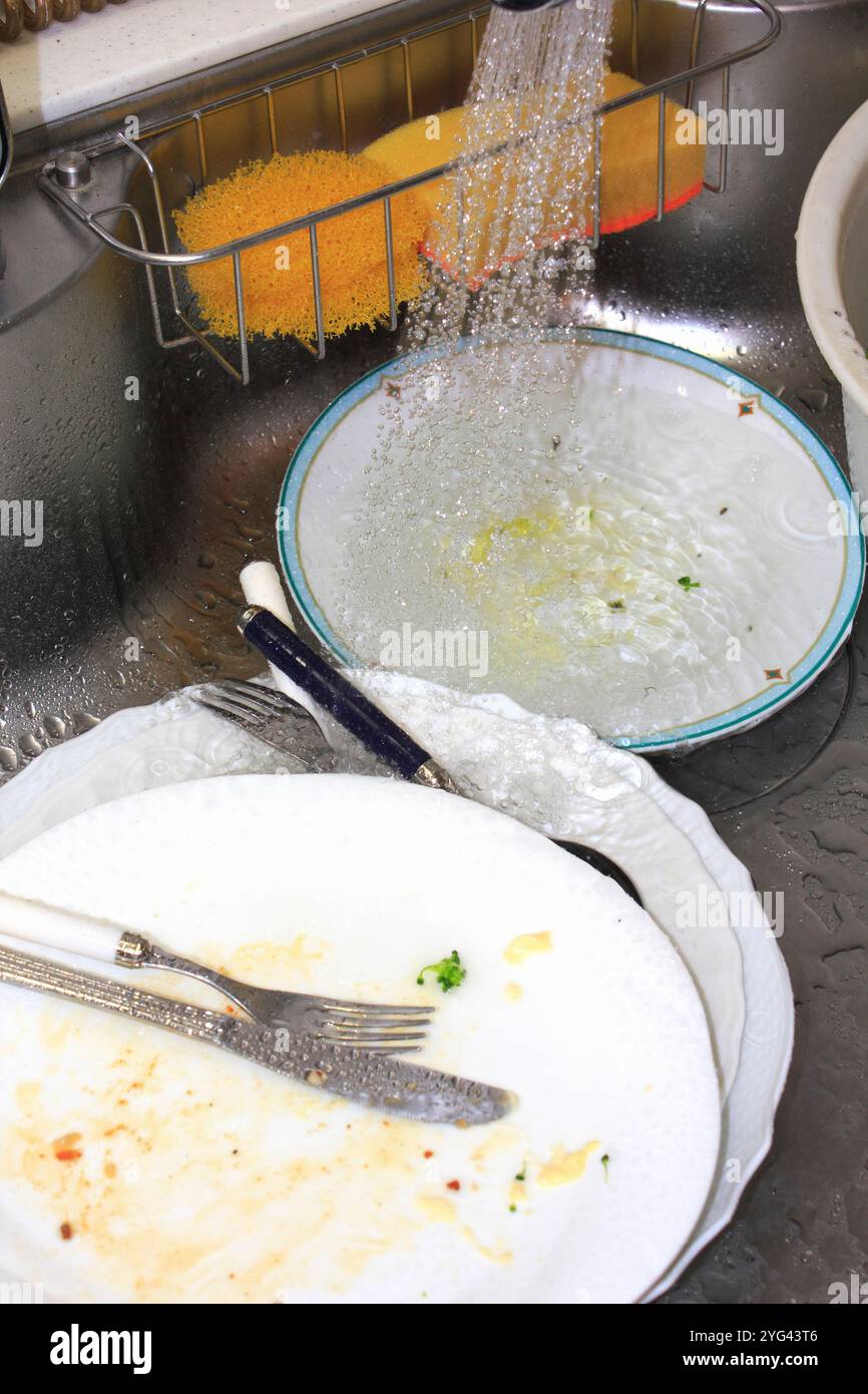 Pot washing hi-res stock photography and images - Alamy