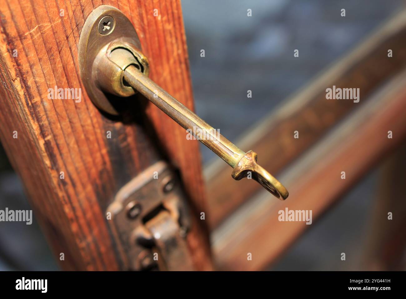 Old-fashioned screw window locks Stock Photo - Alamy