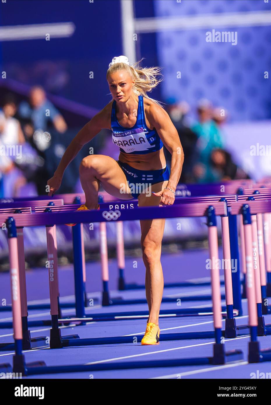 Lotta Harala participating in the 100 meters hurdles at the Paris 2024 ...