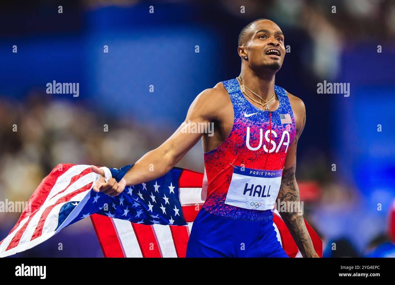Quincy Hall celebrating her victory with her country's flag at the ...