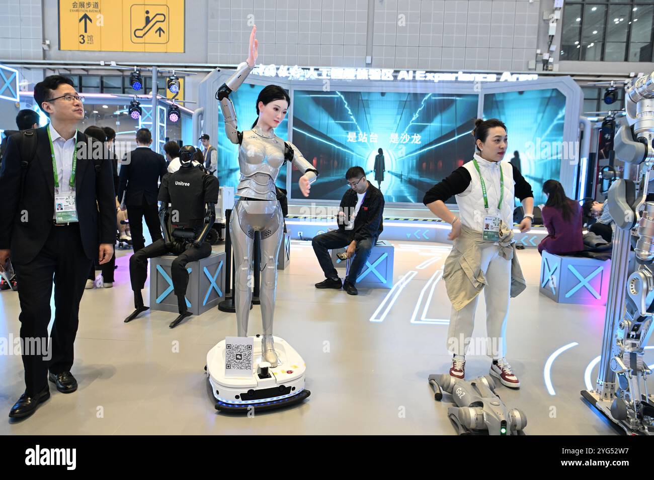 SHANGHAI, CHINA - NOVEMBER 6, 2024 - Visitors watch a demonstration of "Qingbao" humanoid robot ...