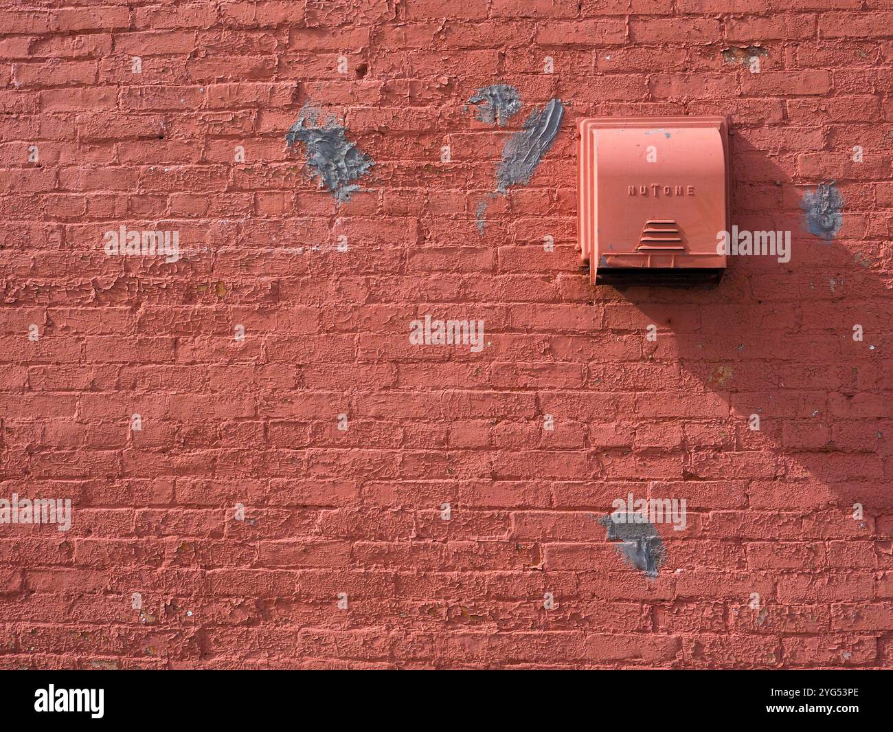distressed red brick wall with vent Stock Photo - Alamy