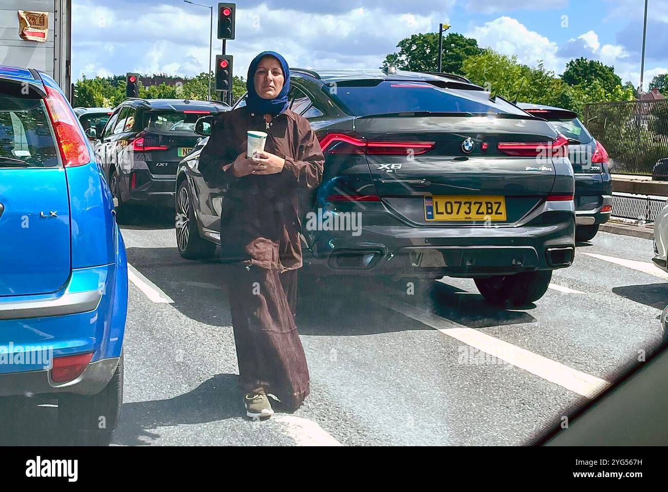 Female street beggar asking hi-res stock photography and images - Alamy