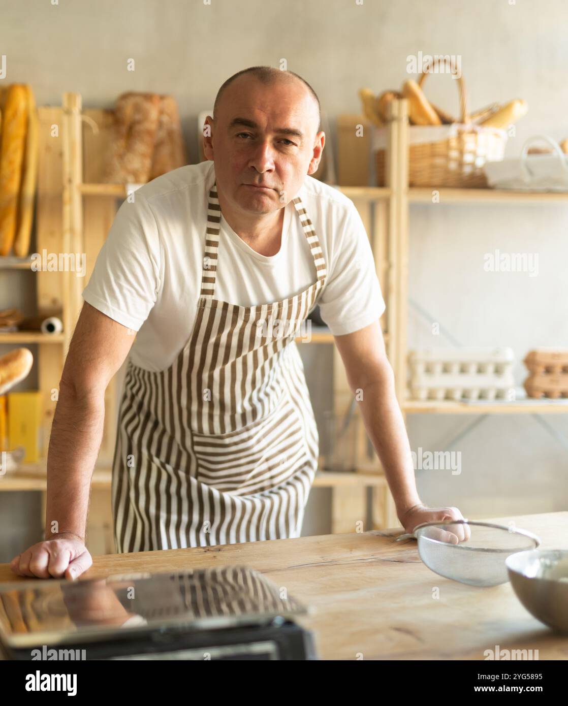 Positive bakery male worker hi-res stock photography and images - Alamy