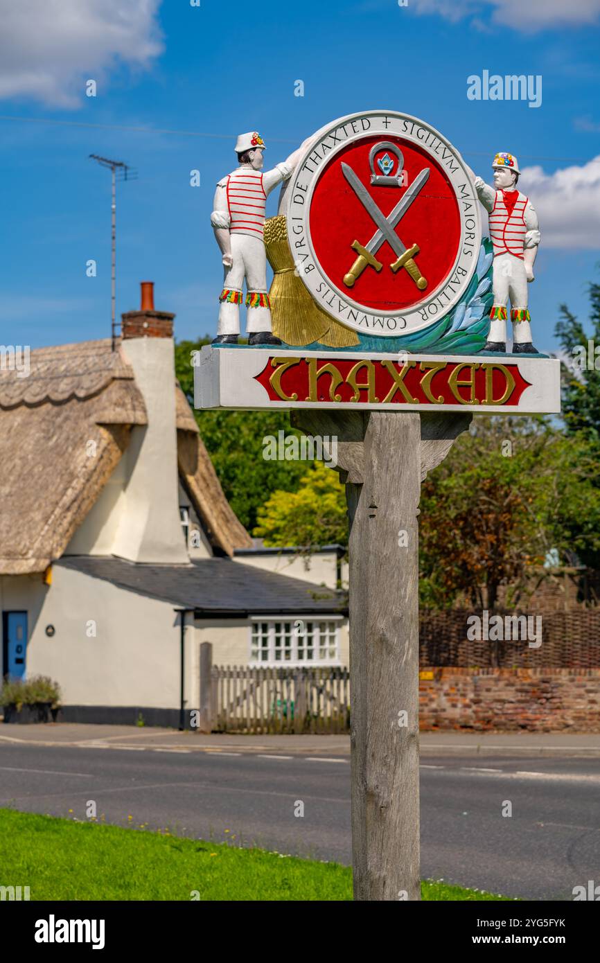 Thaxted village sign Stock Photo - Alamy