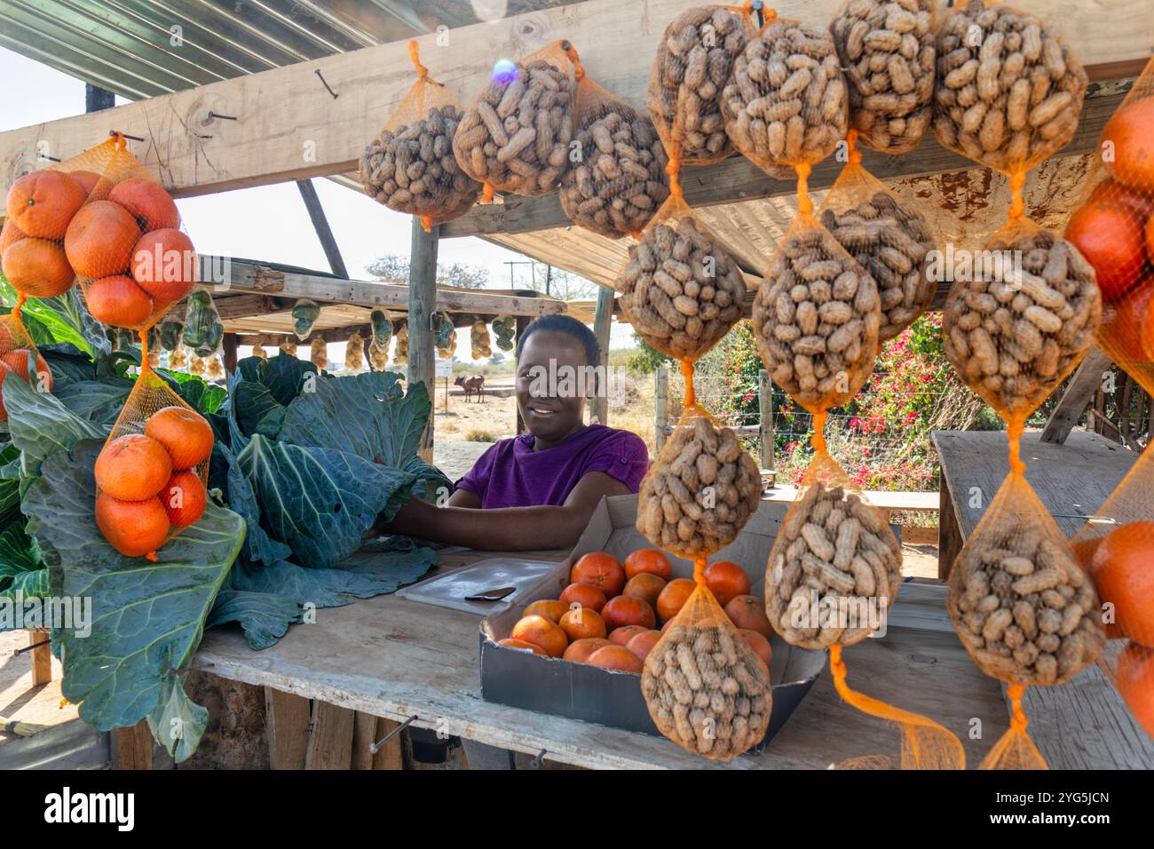 african woman street vendor selling oranges, cabbage, onions, and ...