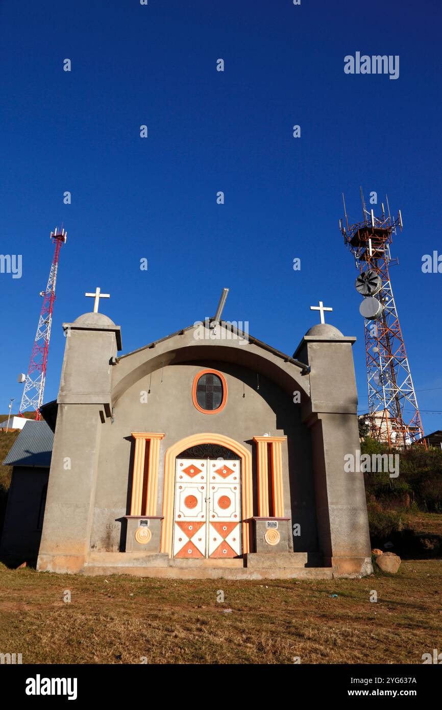Mobile phone / radio masts and modern concrete Calvario church, Coroico ...