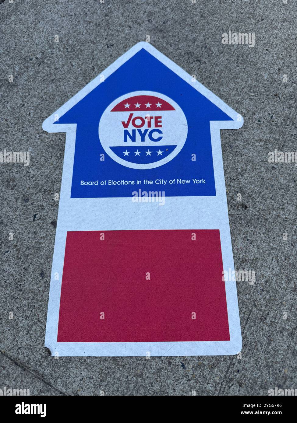 Sidewalk arrow directing voters to their voting site in the 2024 ...