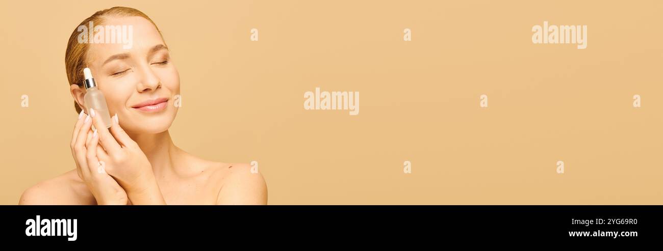 A young beautiful plus size woman is pampering herself while applying ...