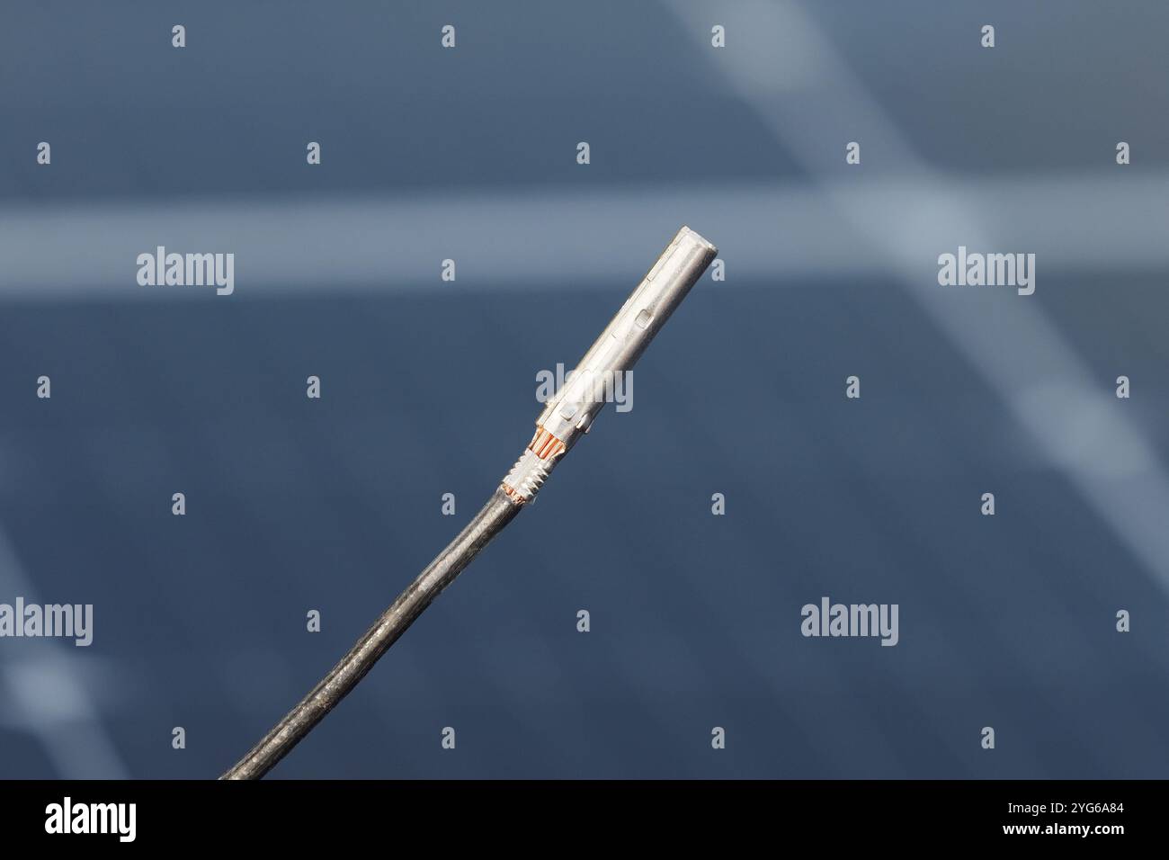 Close-up of wire to connect wires on a solar panel during installation ...