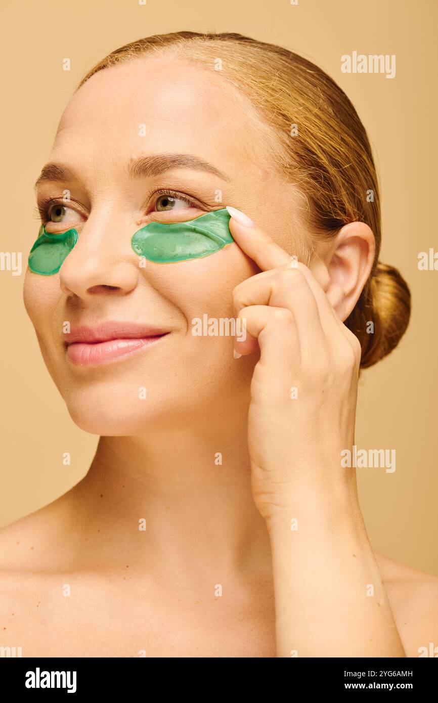 She applies soothing green eye patches while smiling, embracing self ...