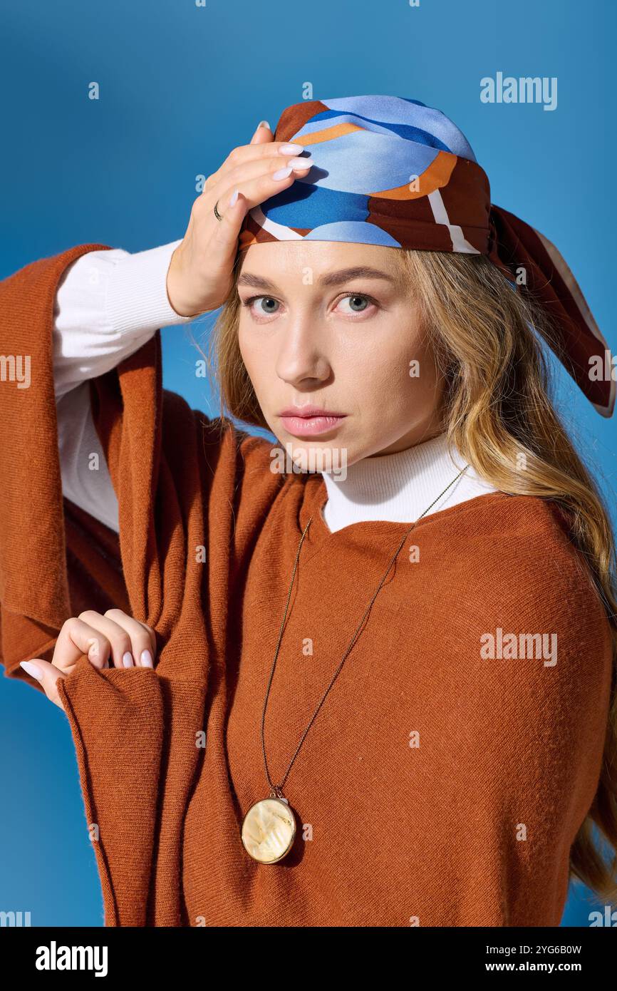 The woman displays confidence while holding her head in a thoughtful ...
