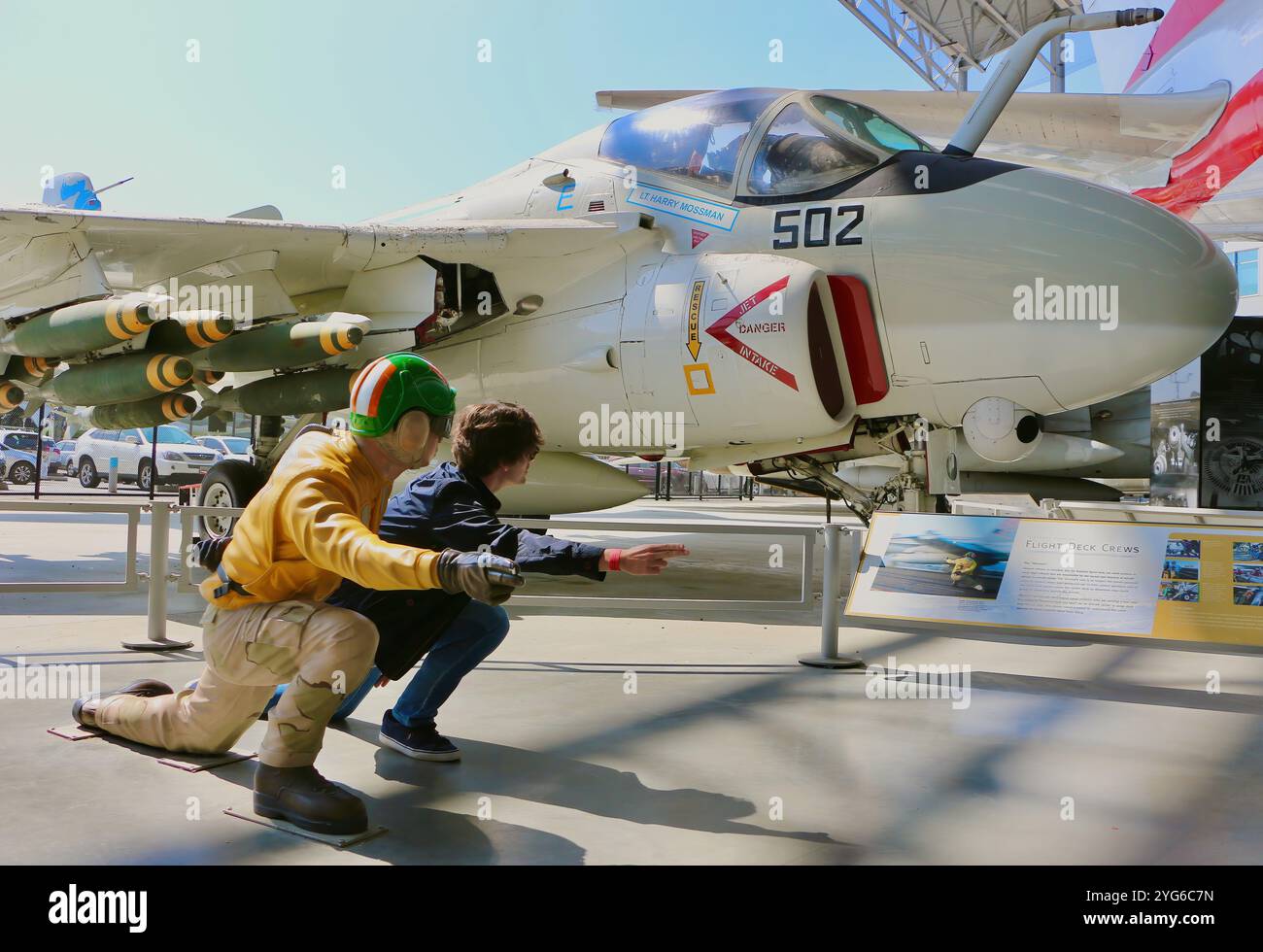 Grumman A-6E Intruder all-weather bomber and a tourist mimicking a ...