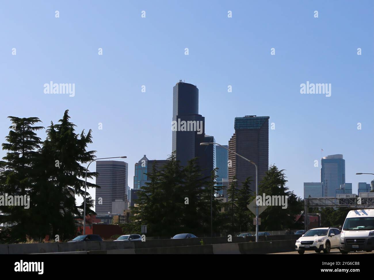 View of the city skyline from inside a car driving north on Interstate ...