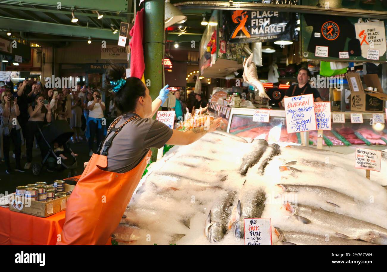 Famous for fish throwing the purchases of customers before wrapping ...