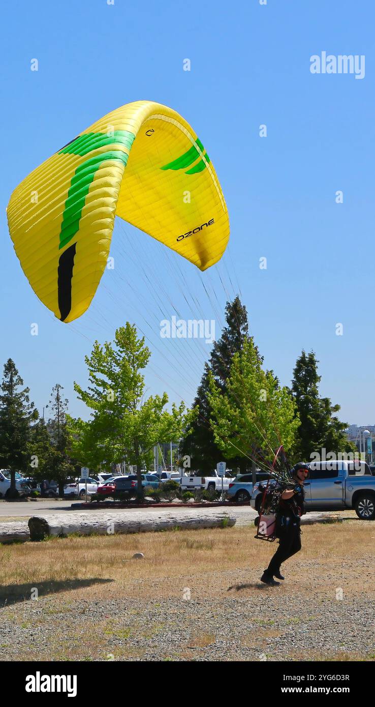 Series of images of a Powered paraglider launching from near the ...