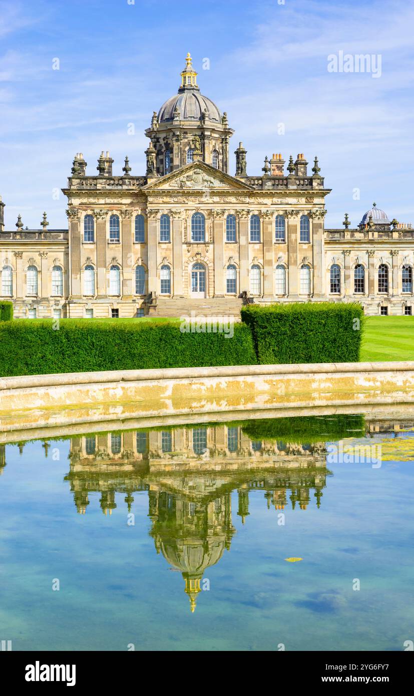 Pool of the Atlas fountain with reflection of Castle Howard Yorkshire ...