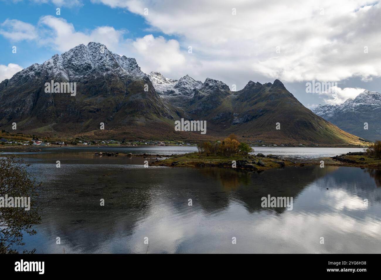 The snow-capped mountains above the village of Laupstad on the island ...