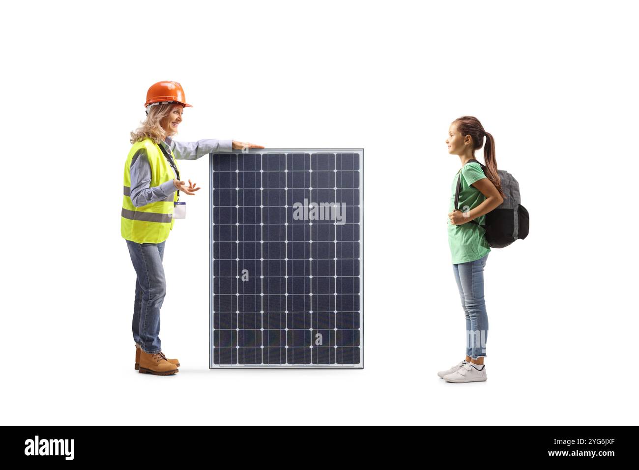 Woman engineer talking to a girl and explaining a solar panel isolated ...
