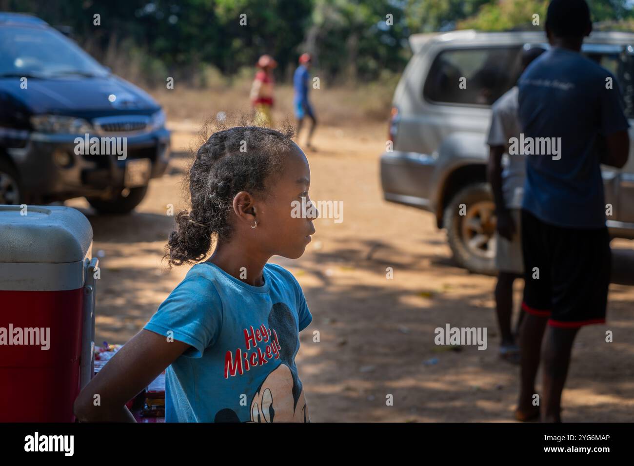 Tsiribihina Ferry Terminal, Madagascar - August 28, 2024: A young local ...