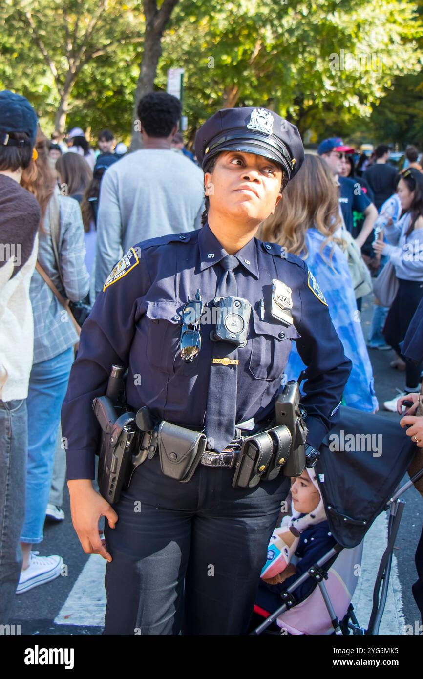 female cop police woman gives side eye in Tompkins Square Halloween Dog ...
