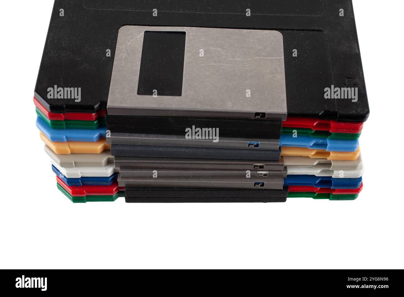 Colored old retro floppy diskettes in stack. Isolated on white ...