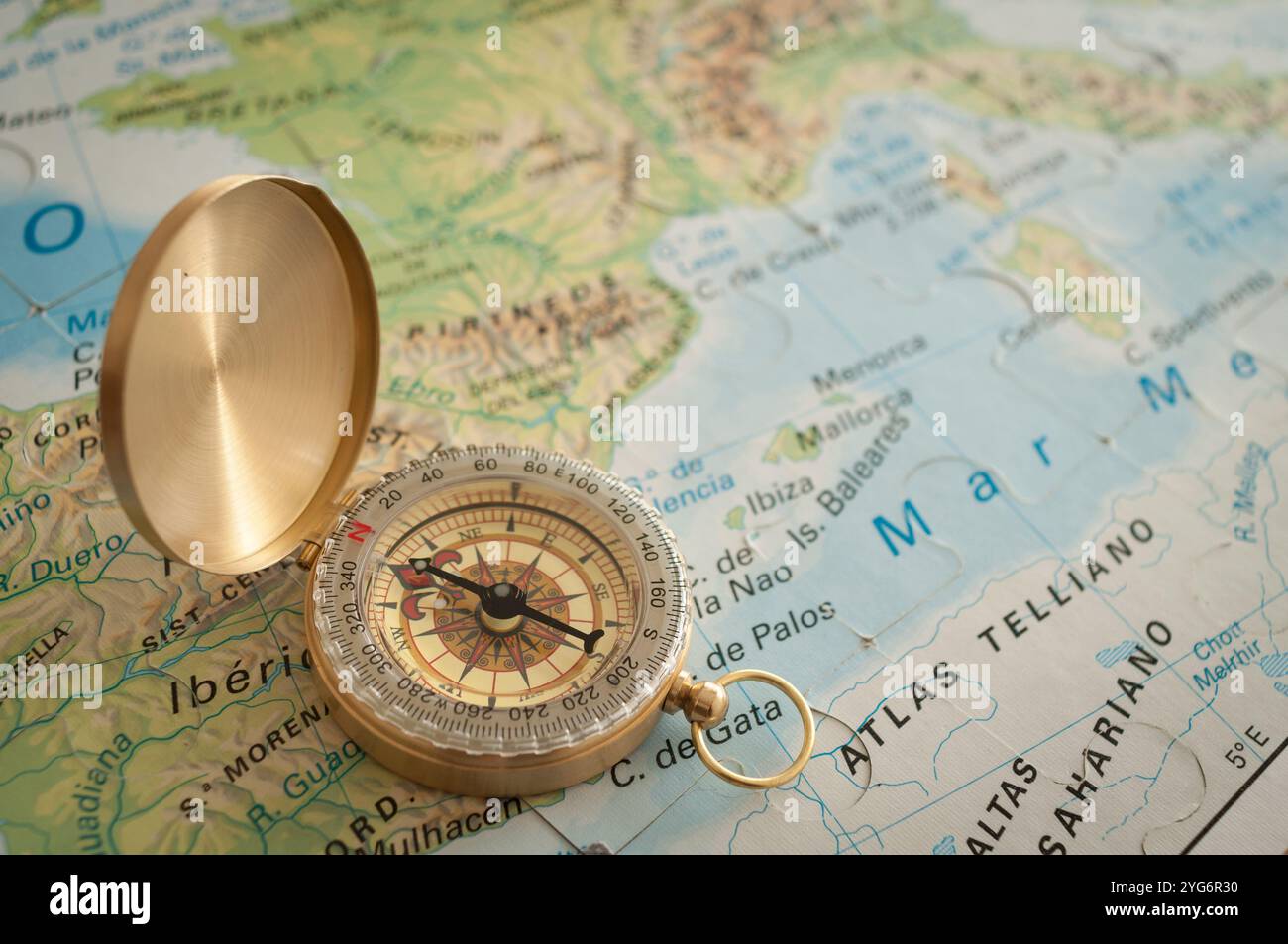 the compass on map Stock Photo - Alamy
