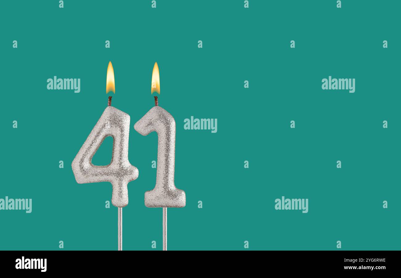 Birthday candle number 41 - Card on a green background Stock Photo - Alamy