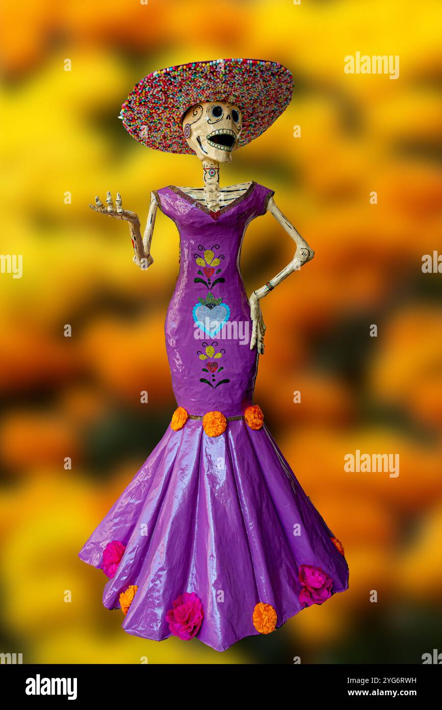 Handcrafted Mexican catrinas made from papier-mâché and adorned with ...