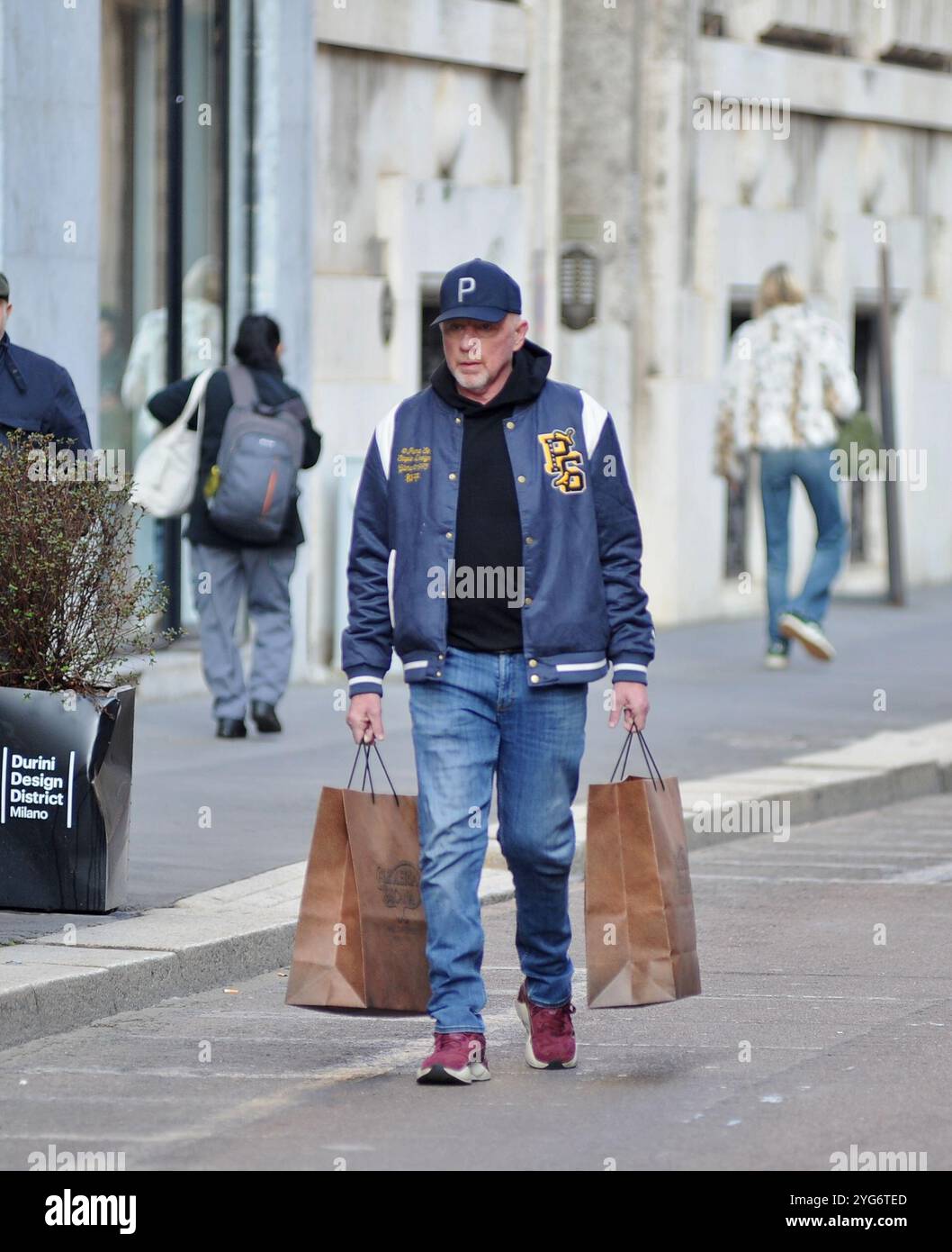 Milan, 06-11-2024 Boris Becker after shopping in the center takes a ...