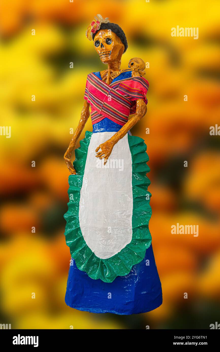 Handcrafted Mexican catrinas made from papier-mâché and adorned with ...