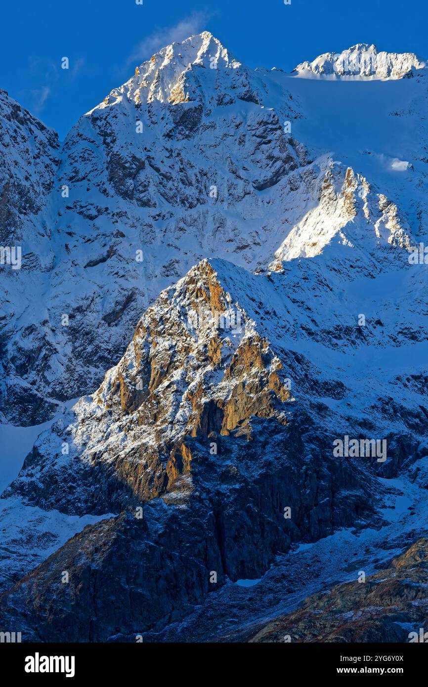 Snow and rocks of La Meije summit in french Alps Stock Photo - Alamy