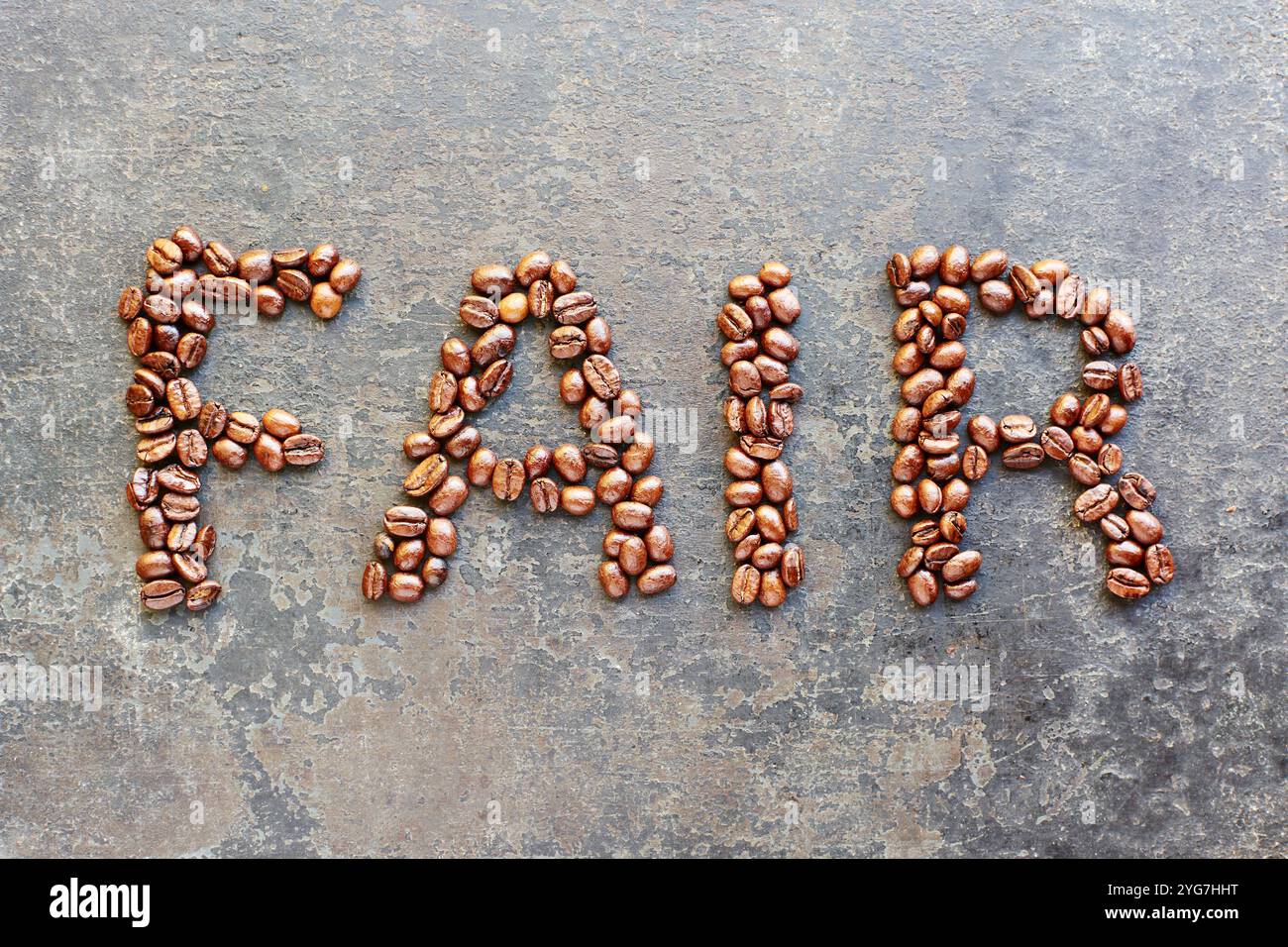 Roasted organic arabica coffee beans spelling out the word 'Fair' Stock ...