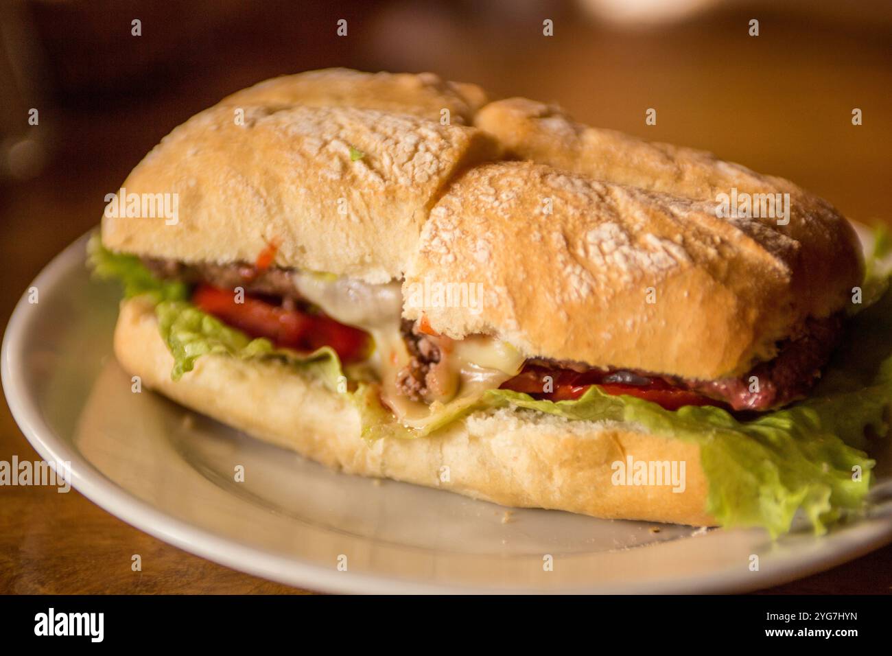 Splitted Peruvian Hamburger freshly made Stock Photo - Alamy