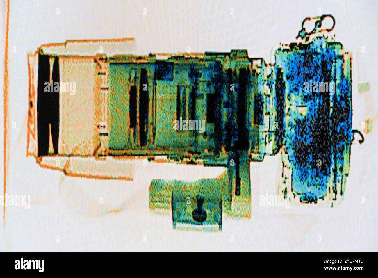 digital security xray image of SLR camera with telephoto lens showing ...