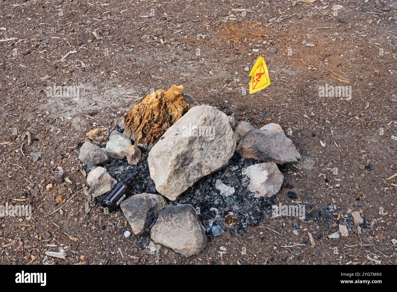 illegal campfire ring on national forest land with no fire flag sign ...